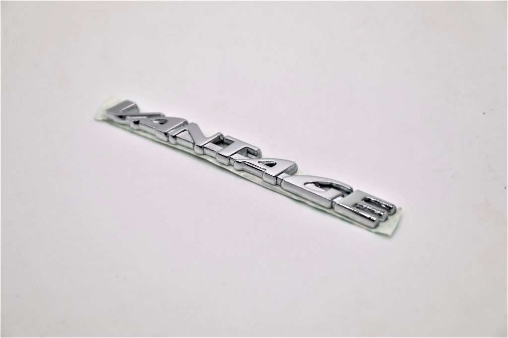Small Chrome Vantage Badge - Self Adhesive - PARTS @ ASTON MARTIN WORKS